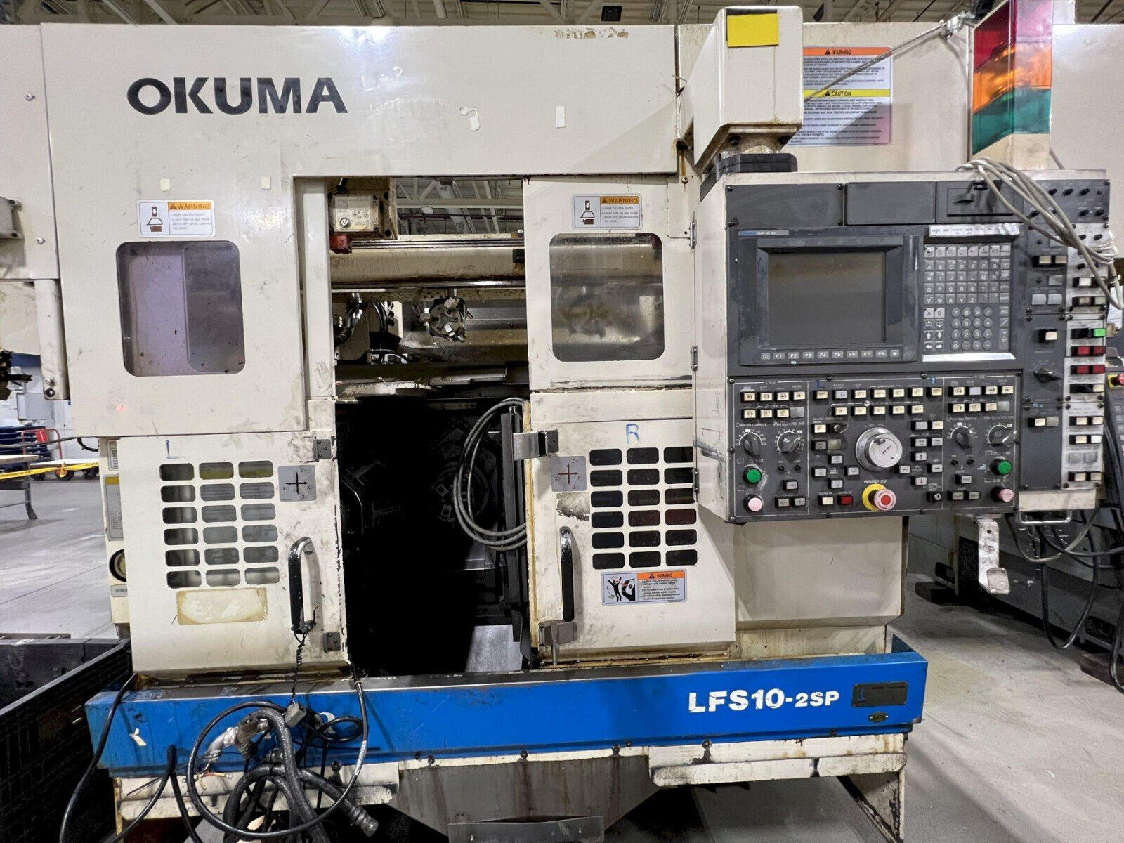 OKUMA LFS10-2SP Twin Spindle CNC Lathe – Year 1997 – Cncbul.co.uk